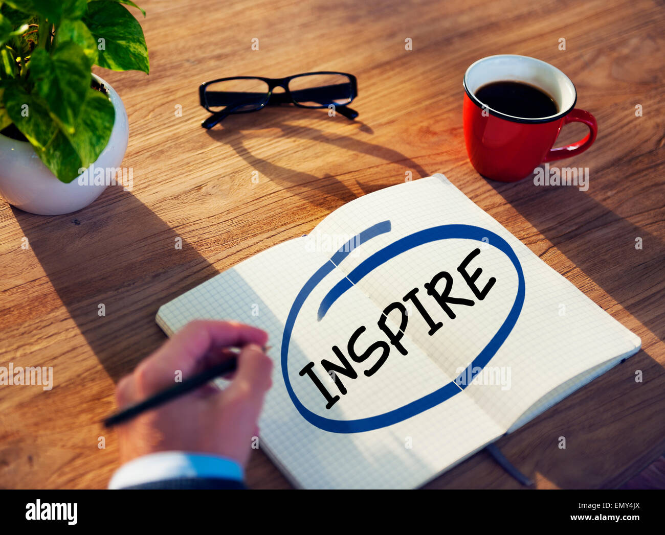 Man with Note Pad and Inspire Concept Stock Photo - Alamy