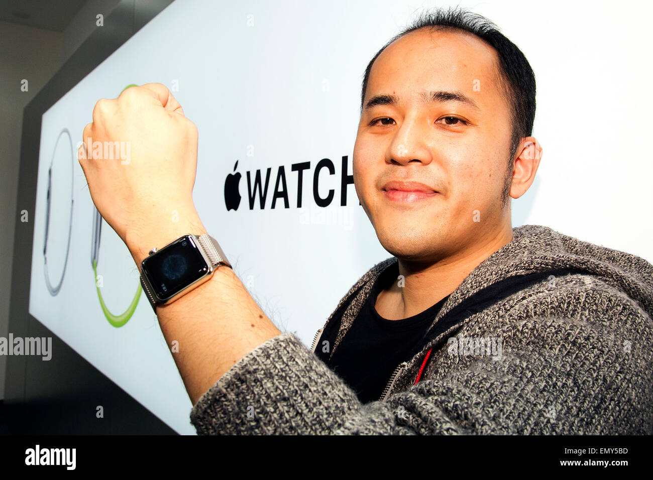 Tokyo, Japan. 24th Apr, 2015. Yuichiro Masui (39) the first customer, who was waiting outside ...