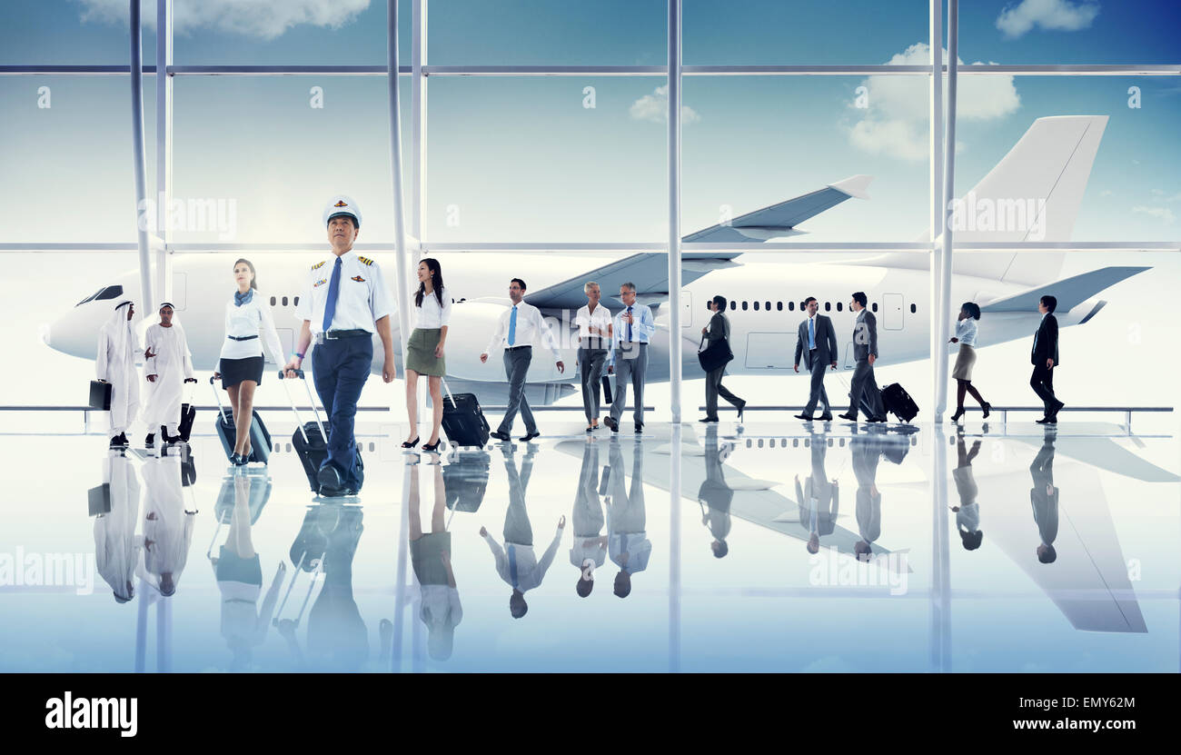 Multiethnic Group of Business People with Airplane Stock Photo - Alamy