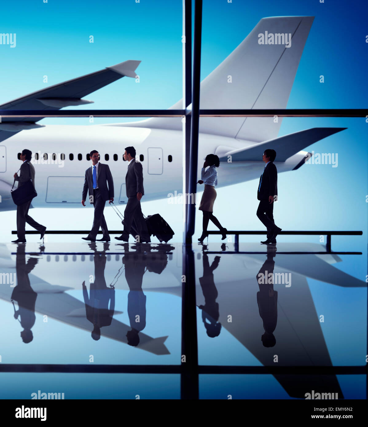 Multiethnic Group of Business People with Airplane Stock Photo - Alamy