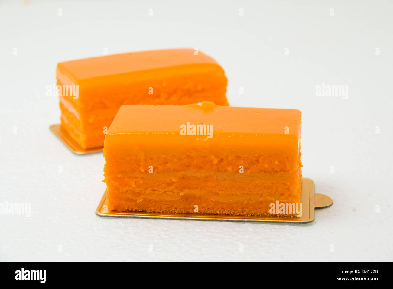 pastry Orange cake on a white background Stock Photo - Alamy
