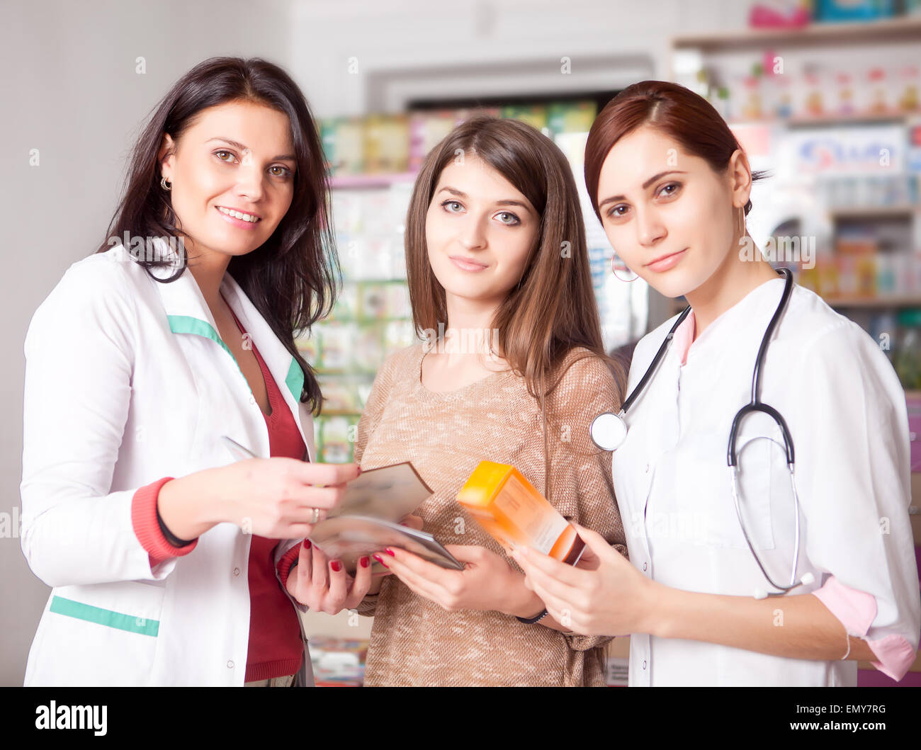 Two doctors one client hi-res stock photography and images - Alamy