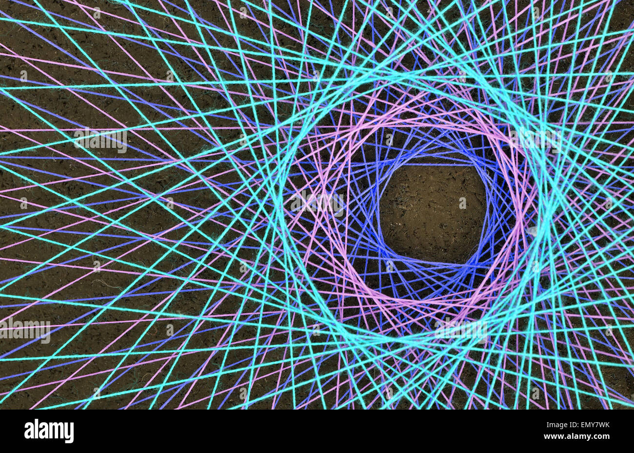 Display of colorful threads on a black panel Stock Photo - Alamy