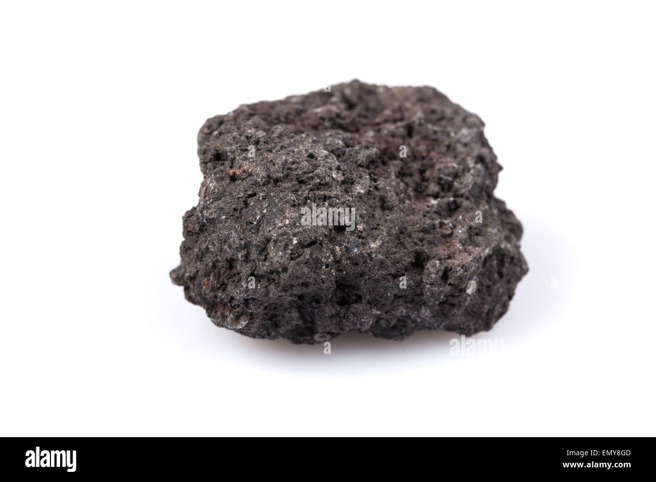 Black lava rock from volcano on a white background Stock Photo - Alamy