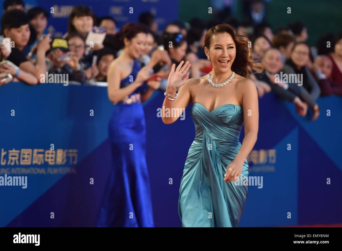Beijing, China. 23rd April, 2015. Singer CoCo Lee walks the red carpet ...