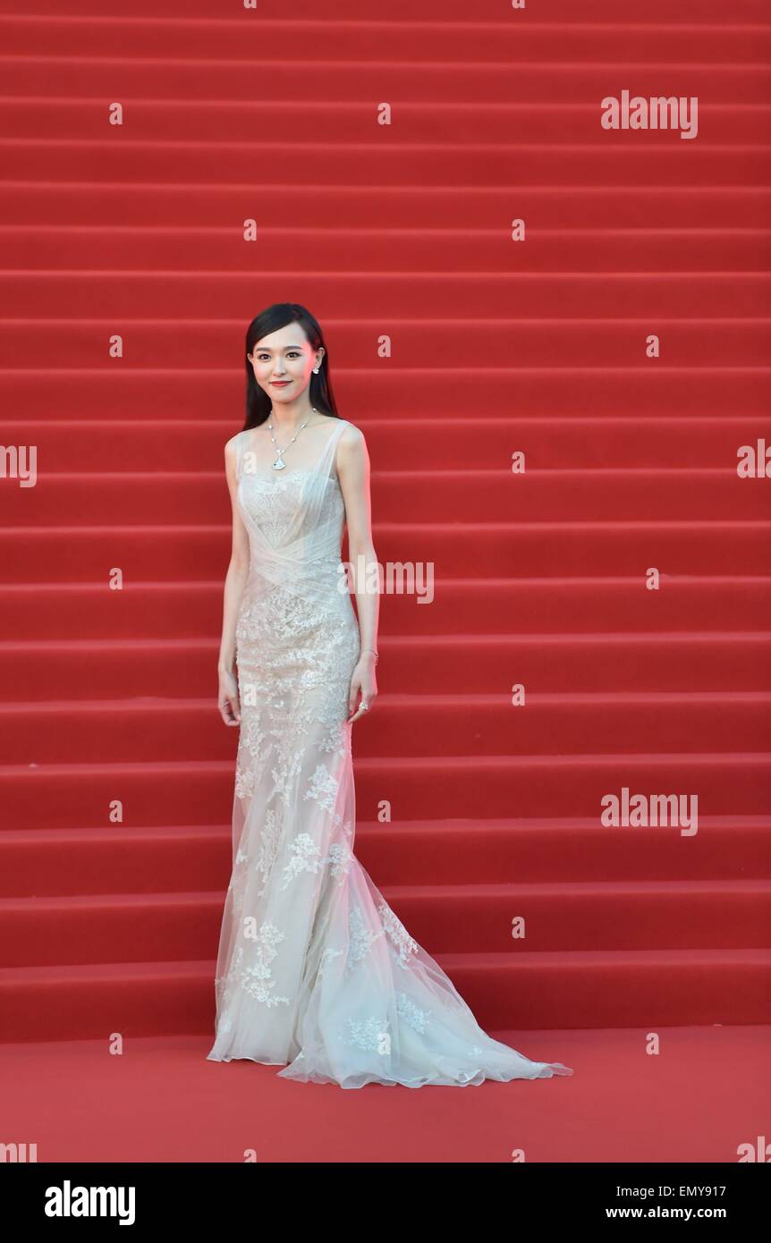 Beijing, China. 23rd April, 2015. Actress Tang Yan walks the red carpet during the closing ...