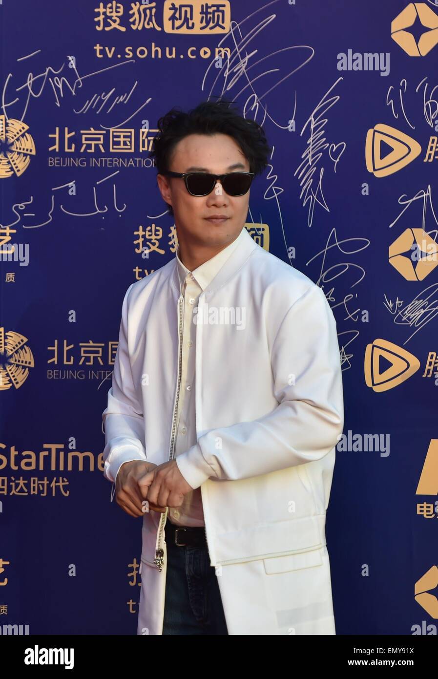 Beijing, China. 23rd April, 2015. Singer and actor Eason Chan walks the ...