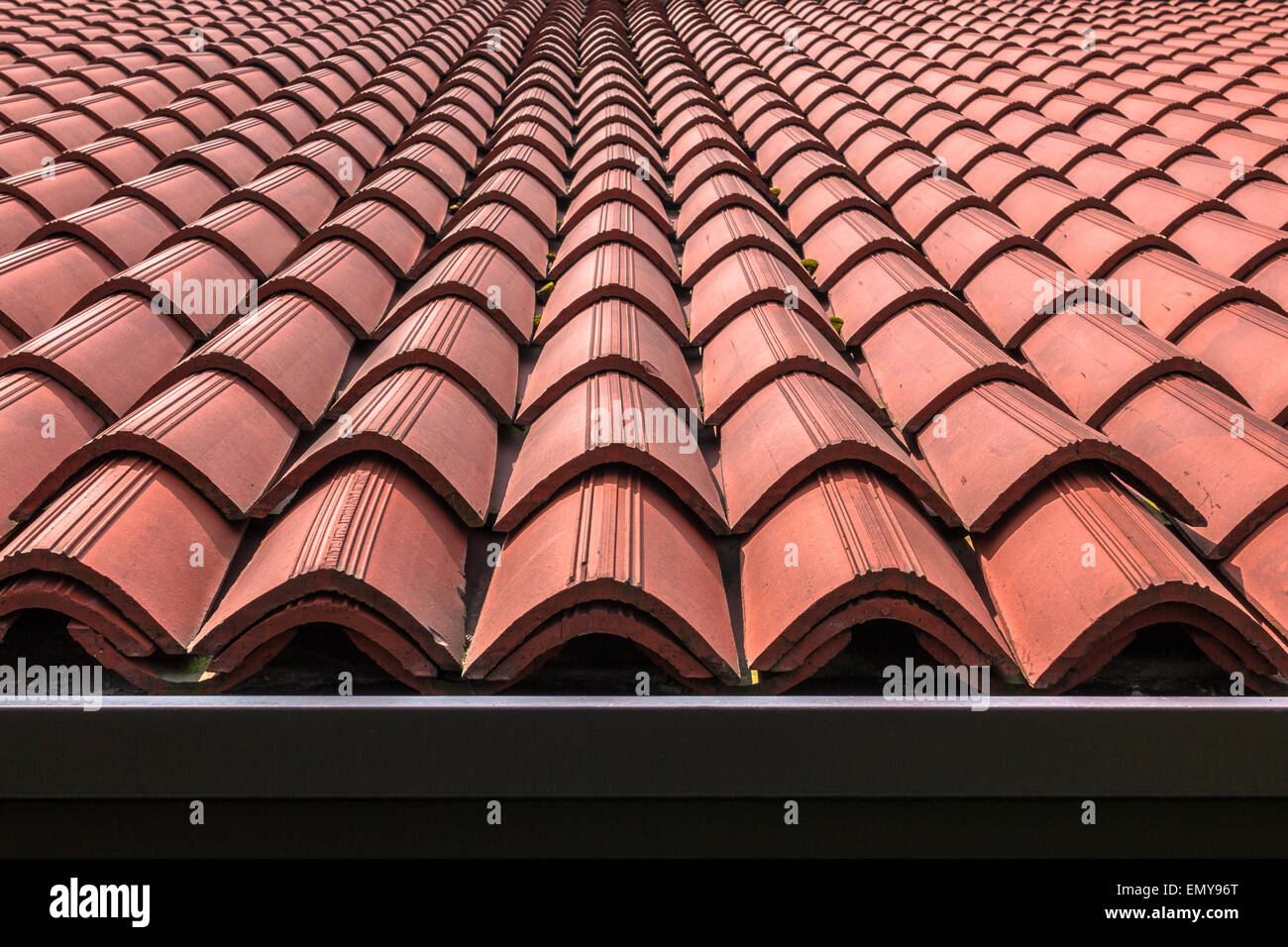 Front view of a tiled roof brown Stock Photo - Alamy