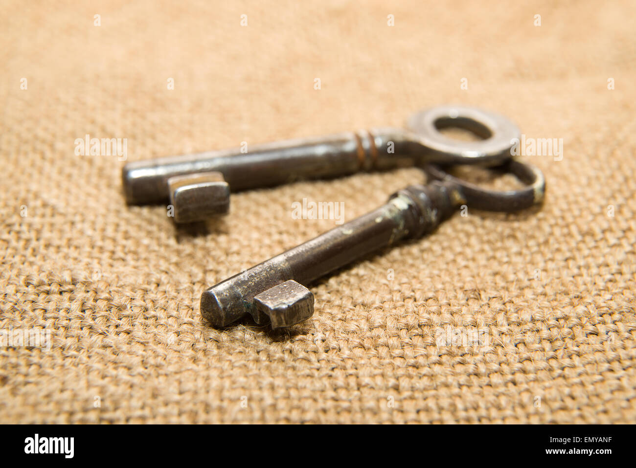 Two Vintage keys on old cloth Stock Photo - Alamy