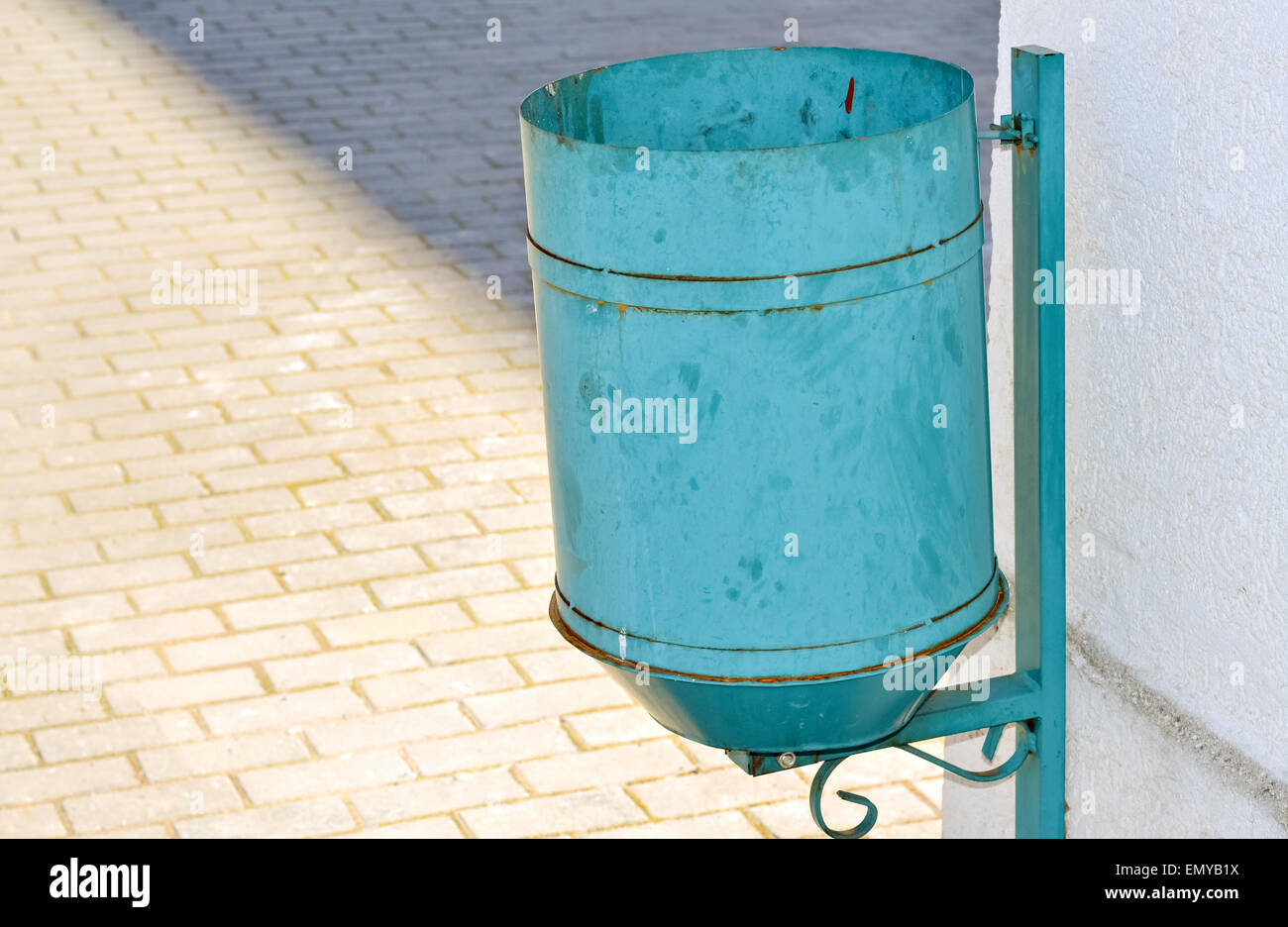 Closeup of a blue trash can on the street in pastel colors Stock Photo ...