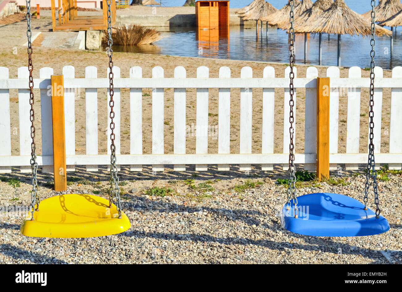 Children playing park fence hi-res stock photography and images - Alamy