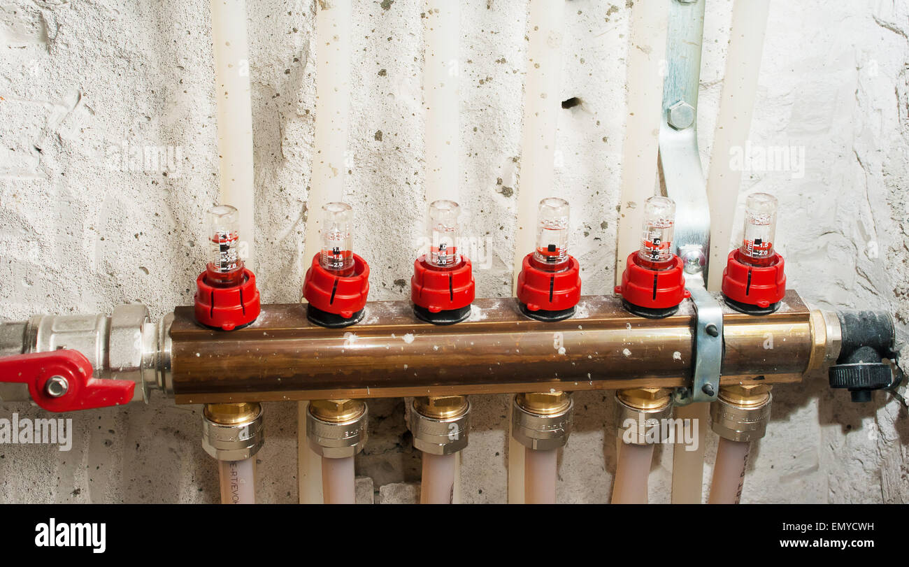 system heating metal and plastic pipes detail closeup indoor Stock ...