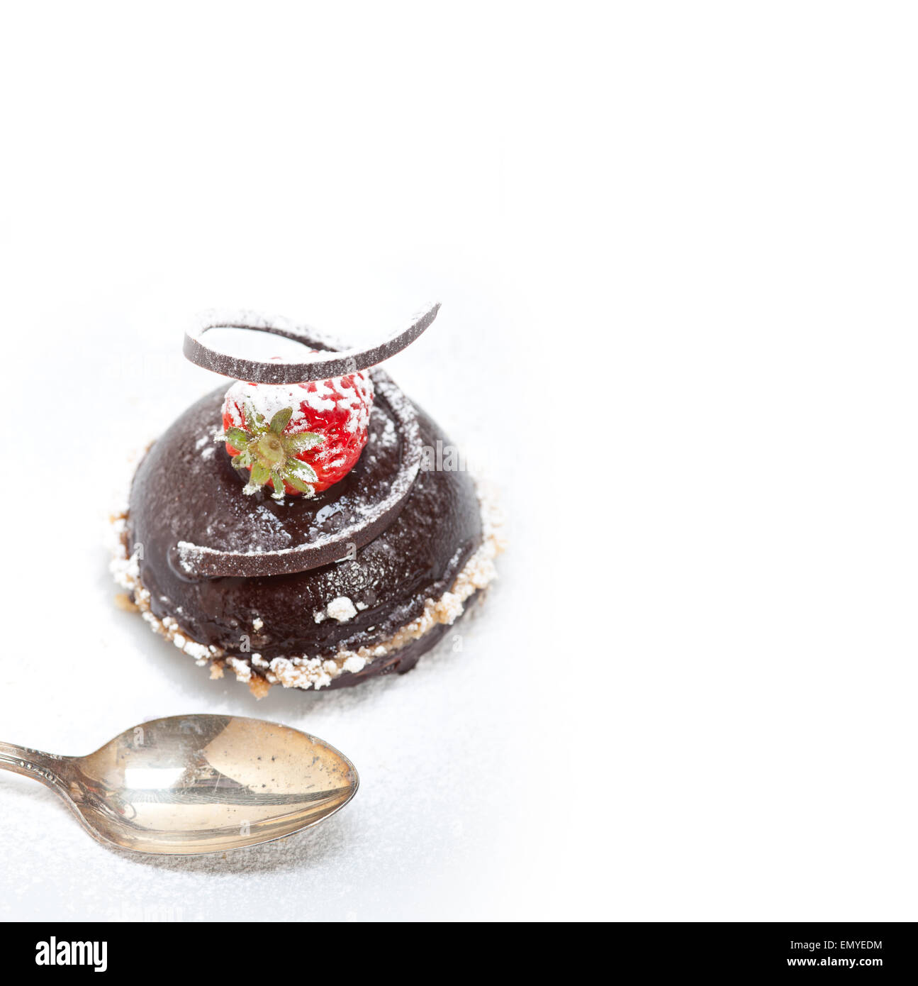 fresh chocolate strawberry mousse over white with silver spoon Stock ...