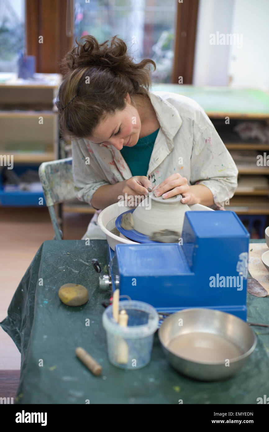 Women participating in a pottery class, art class, making ceramics ...