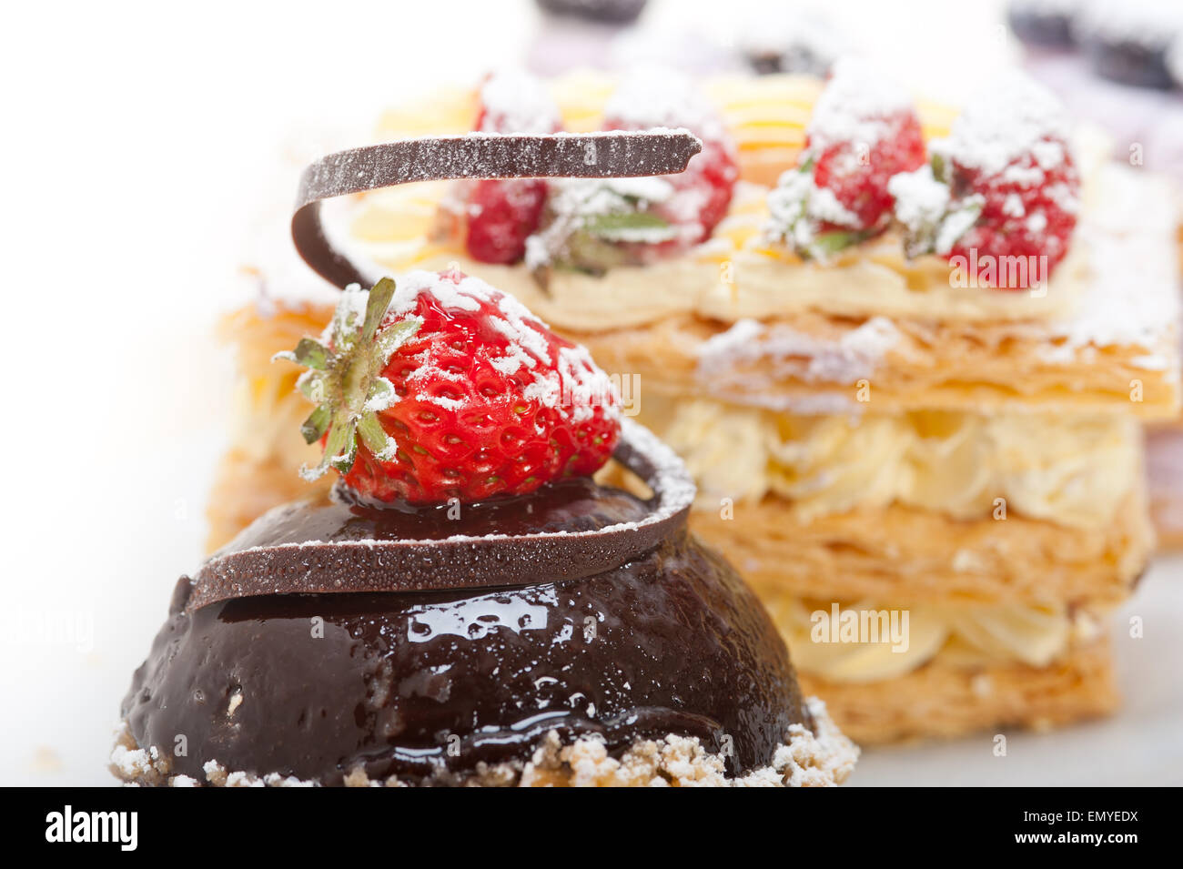 selection of fresh cream napoleon and chocolate mousse cake dessert ...