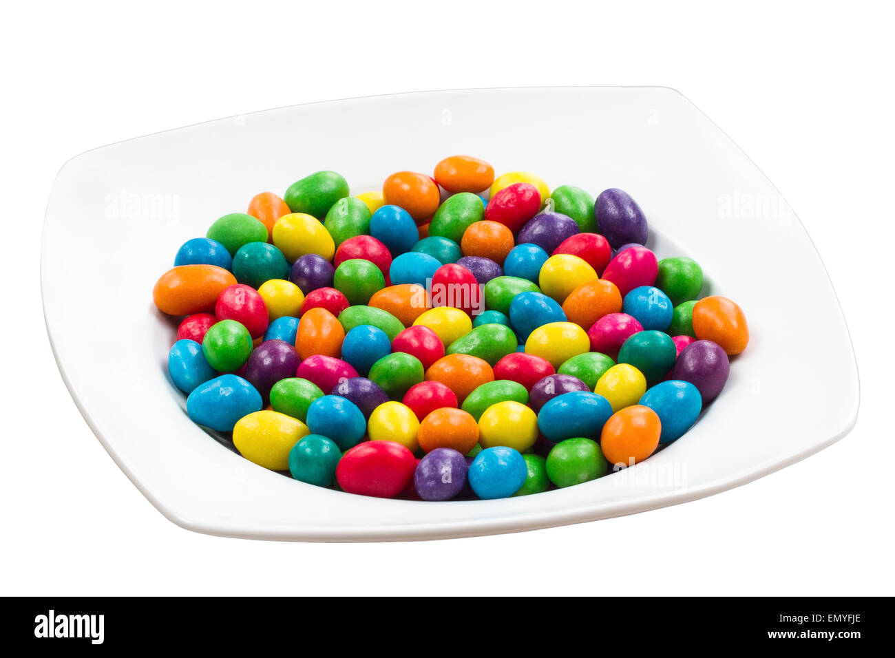 White plate of colorful candy isolated over white background. S Stock ...