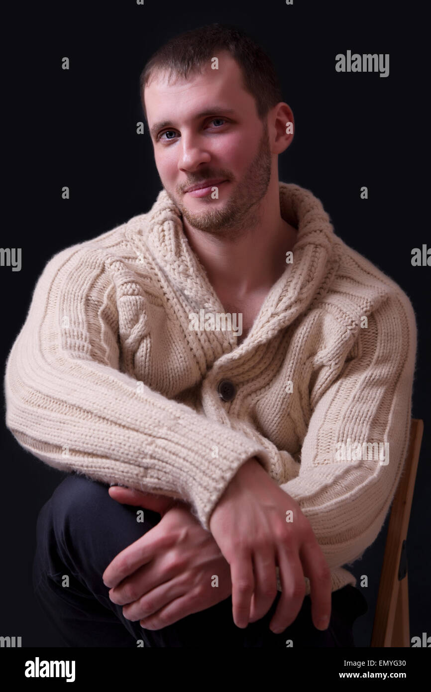 Portrait of a beautiful young man, black background Stock Photo - Alamy