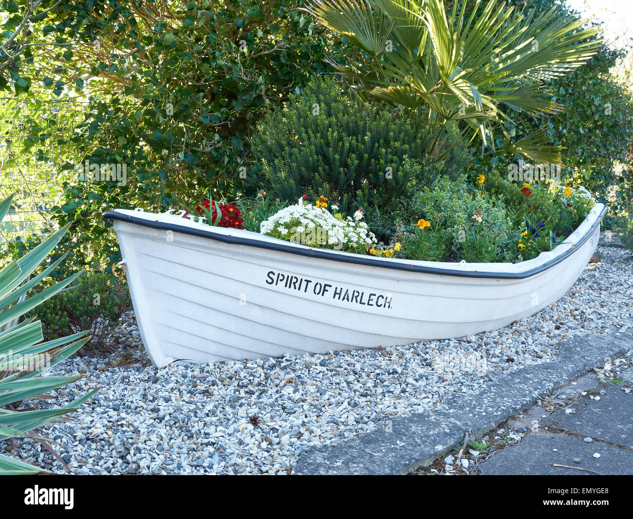 Rowing boat flower display at Harlech railway station Gwynedd Wales UK ...
