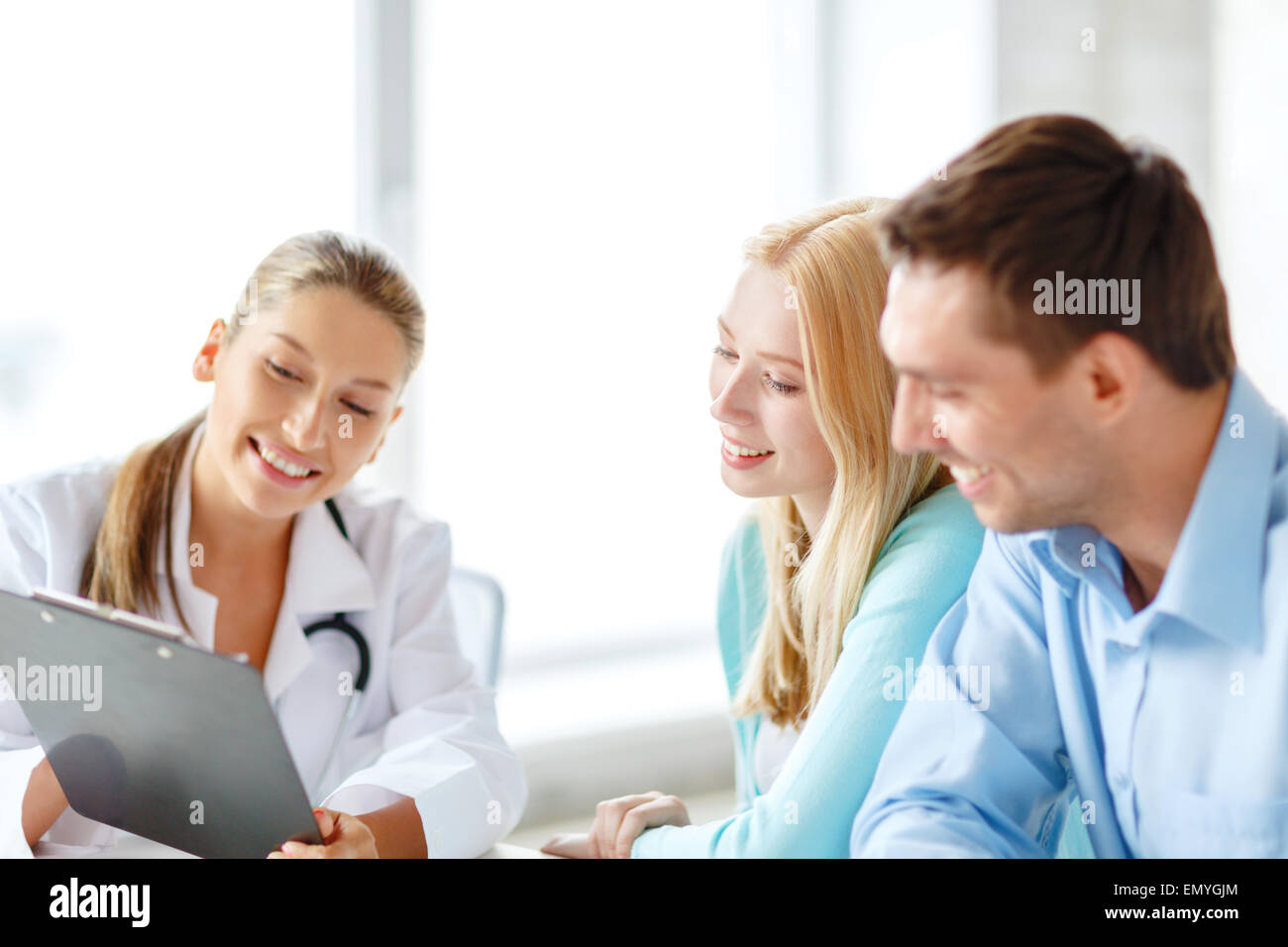smiling doctor with patients in hospital Stock Photo - Alamy