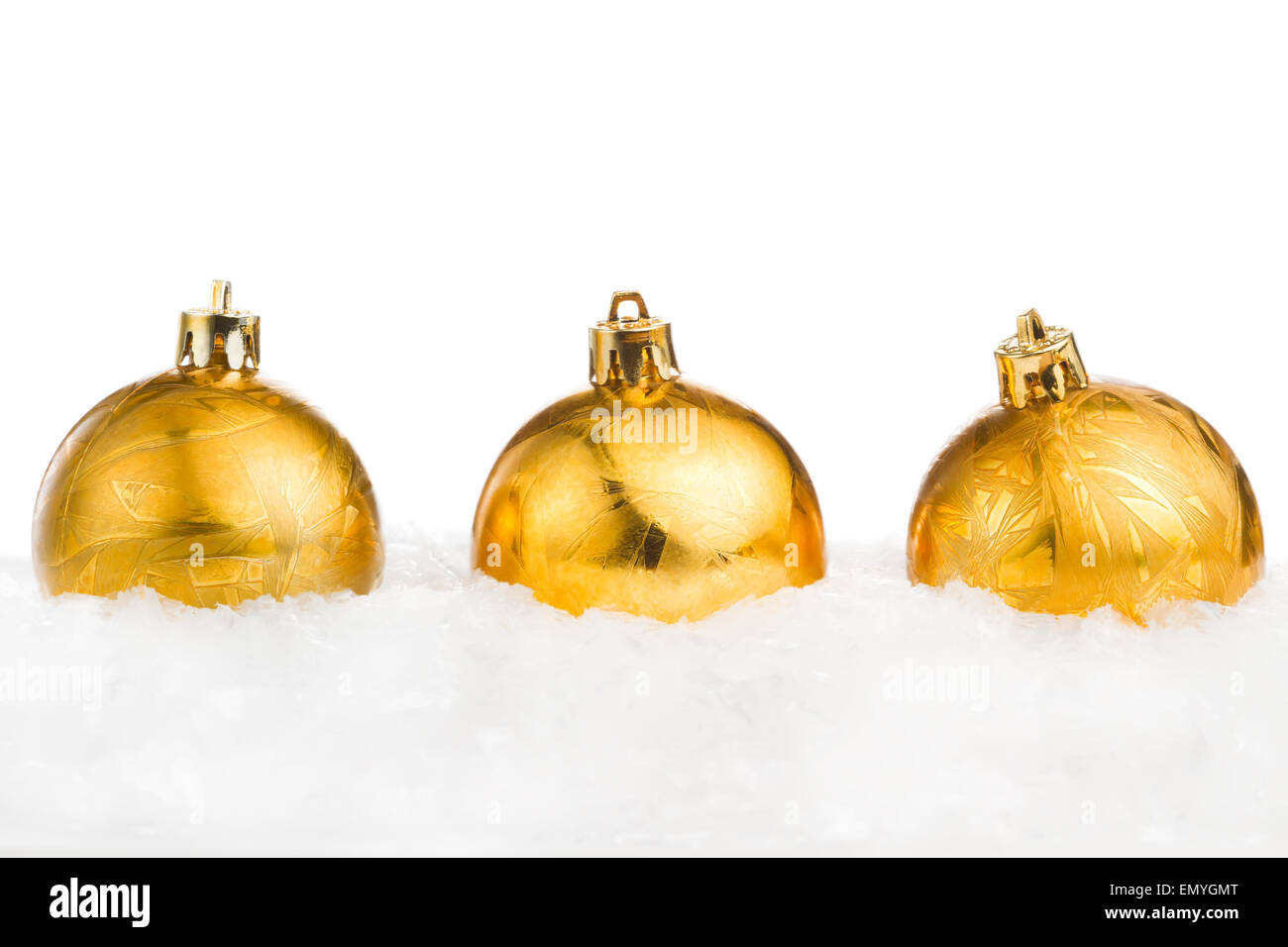 Golden Christmas balls on ice and snow isolated on white backgro Stock ...