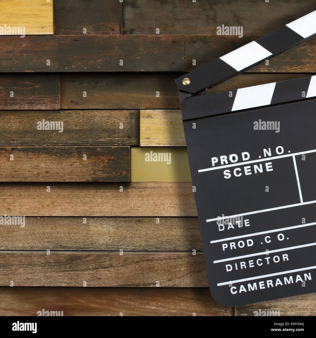 Movie production clapper board over vintage wooden background wi Stock ...