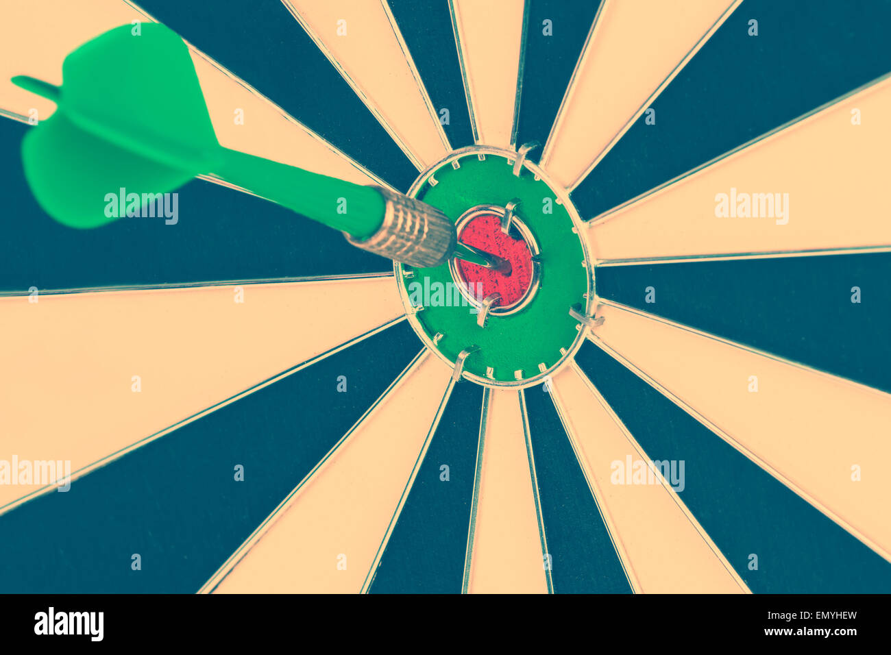 Darts hitting a target close-up Stock Photo - Alamy
