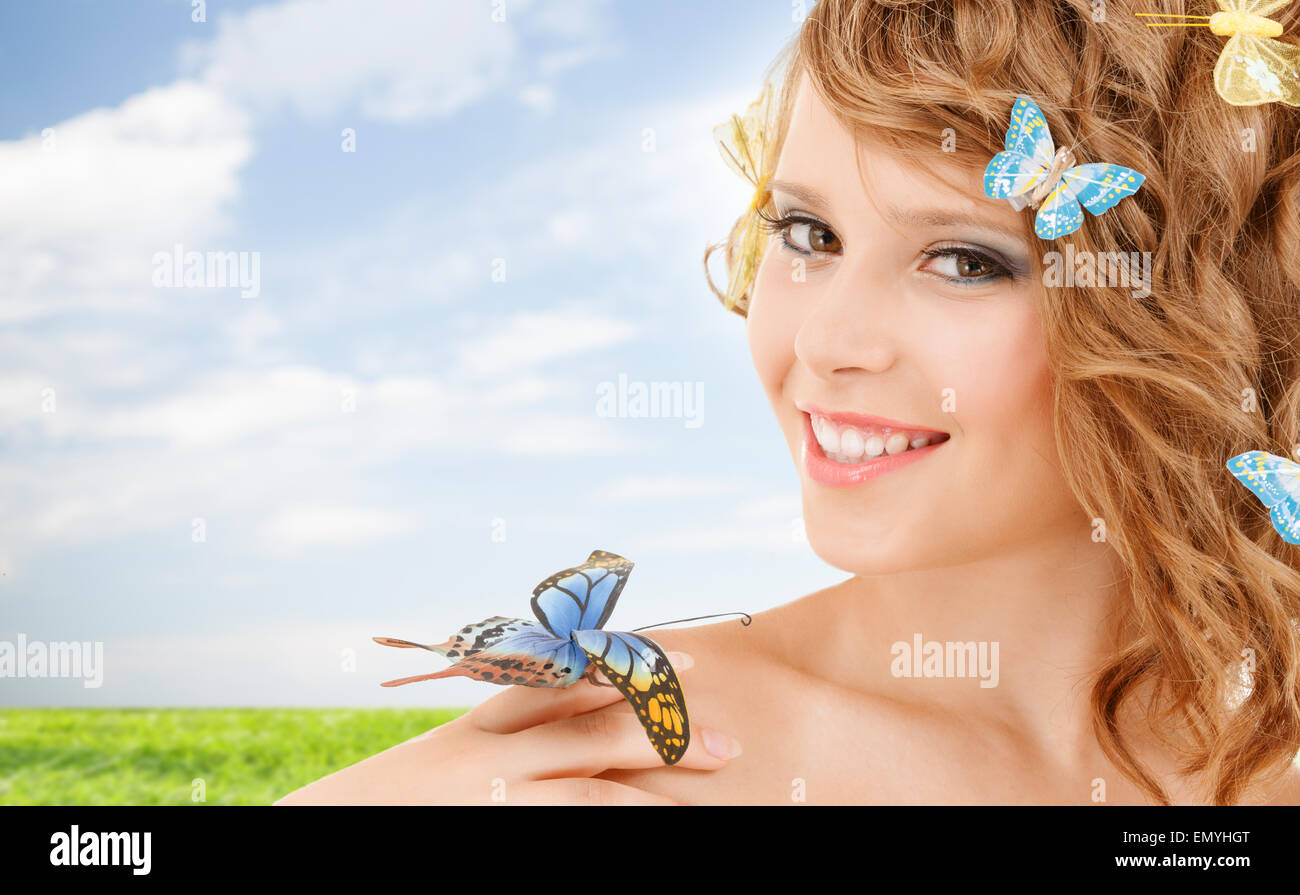 happy teenage girl with butterflies in hair Stock Photo - Alamy