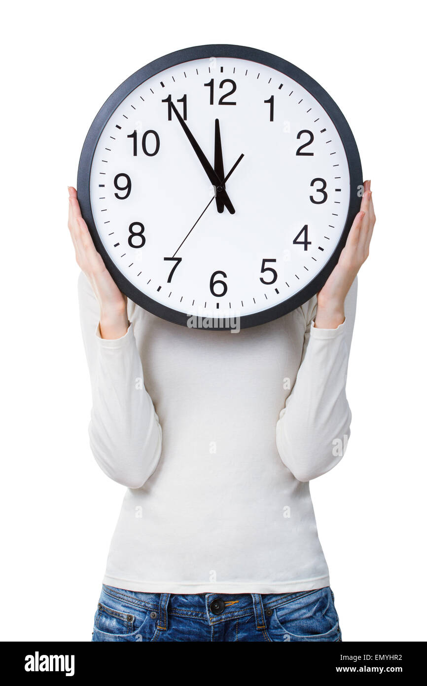 Woman holding clock over face hi-res stock photography and images - Alamy