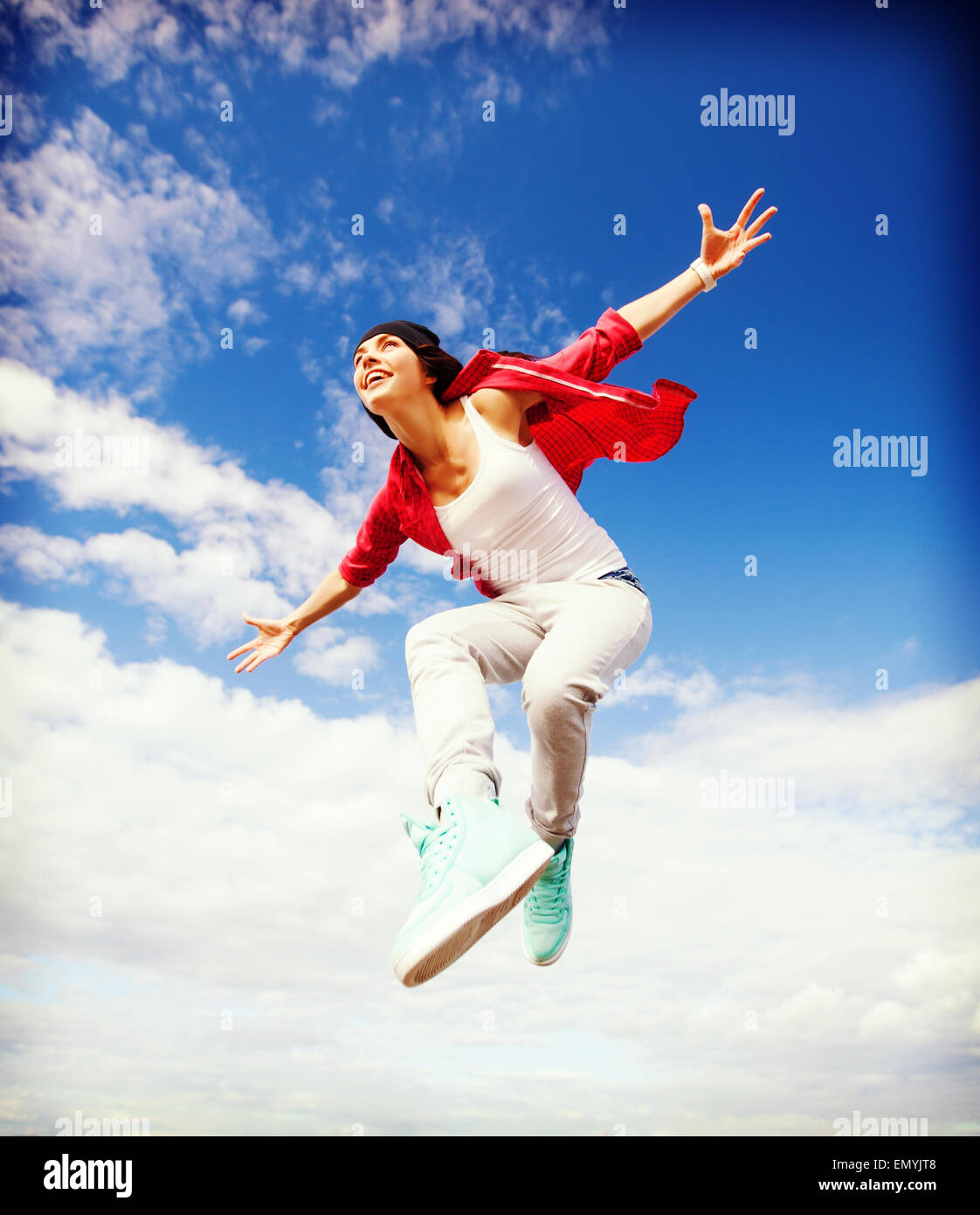 beautiful dancing girl jumping Stock Photo - Alamy