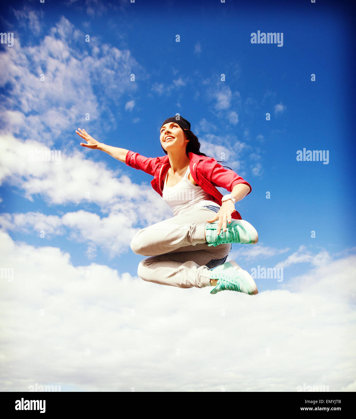 beautiful dancing girl jumping Stock Photo - Alamy