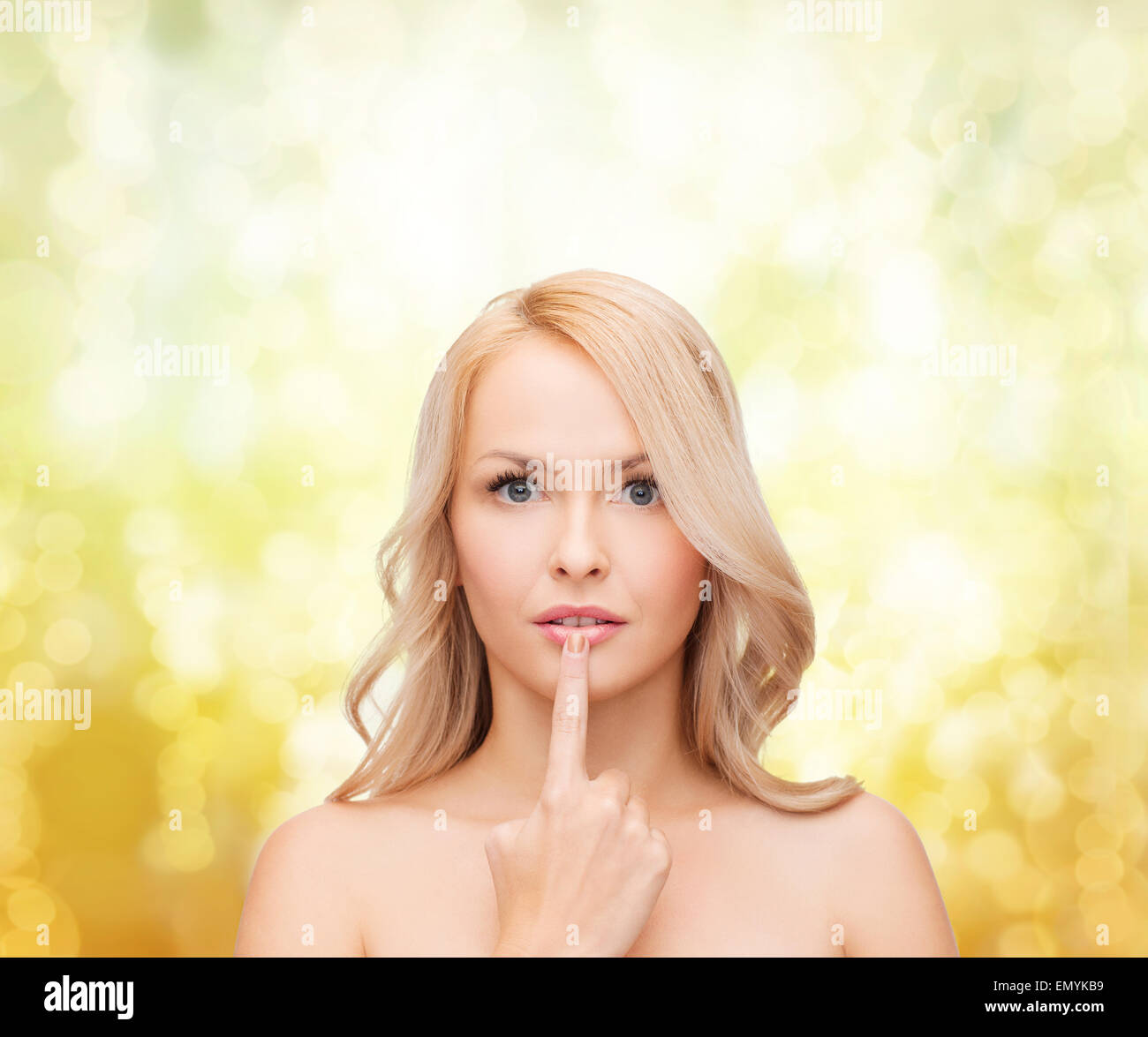 woman touching her lips Stock Photo - Alamy