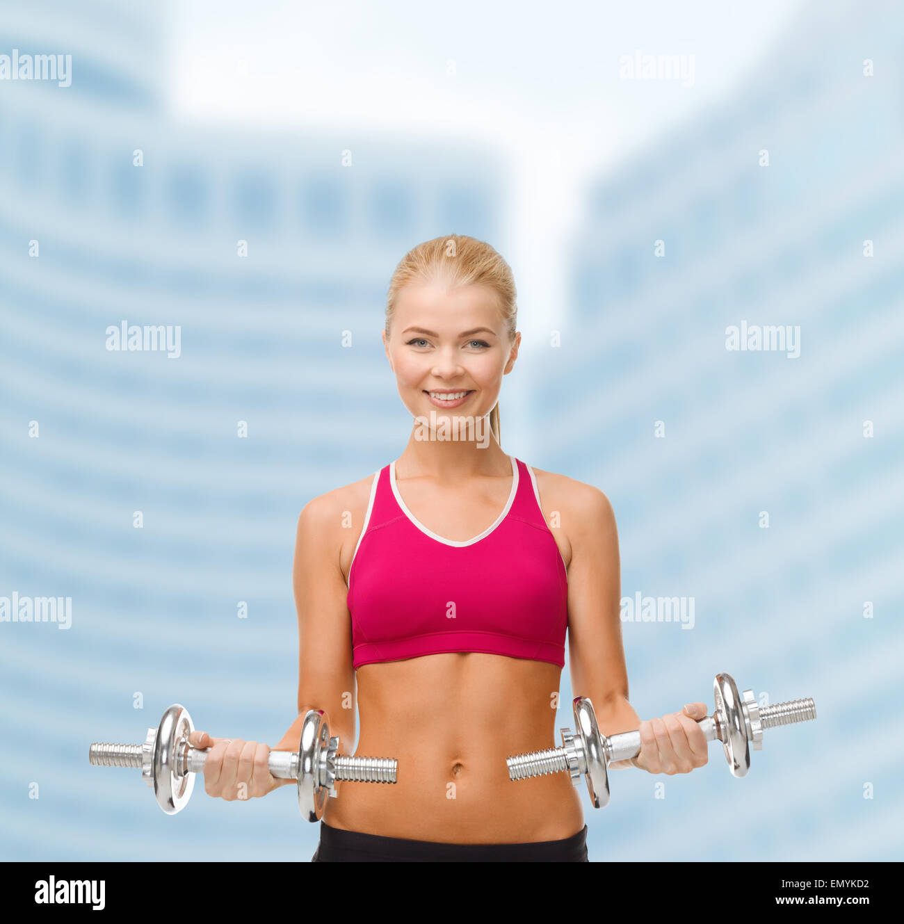 woman with heavy steel dumbbells Stock Photo - Alamy