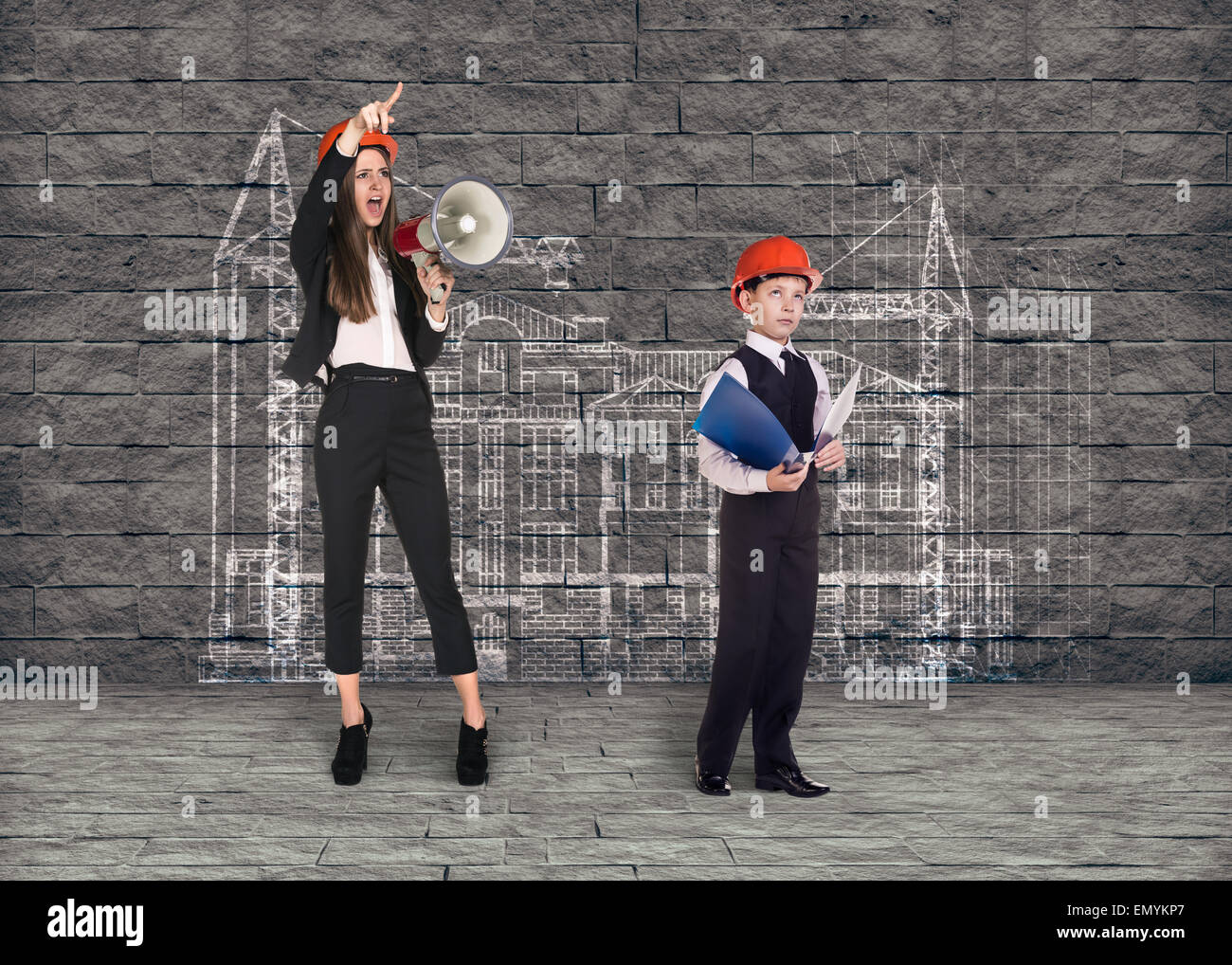 Little boy and woman builder Stock Photo - Alamy