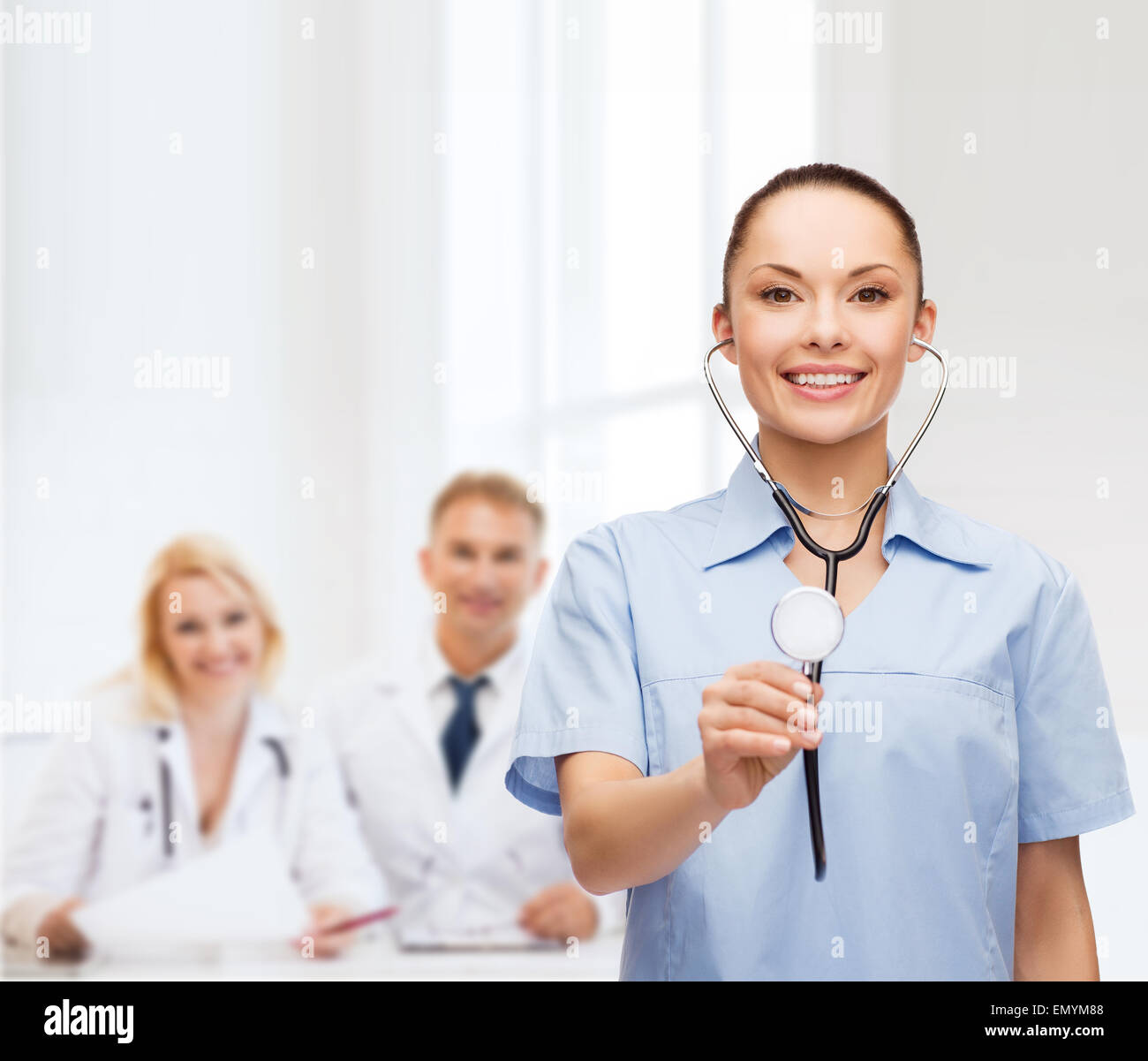 smiling female doctor or nurse with stethoscope Stock Photo - Alamy