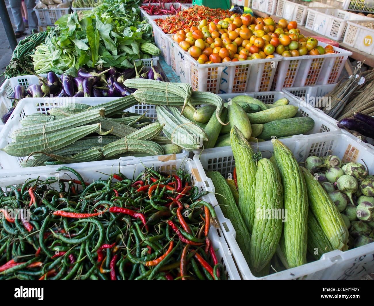 Stands of fruits and vegetables in the local market in the town of ...