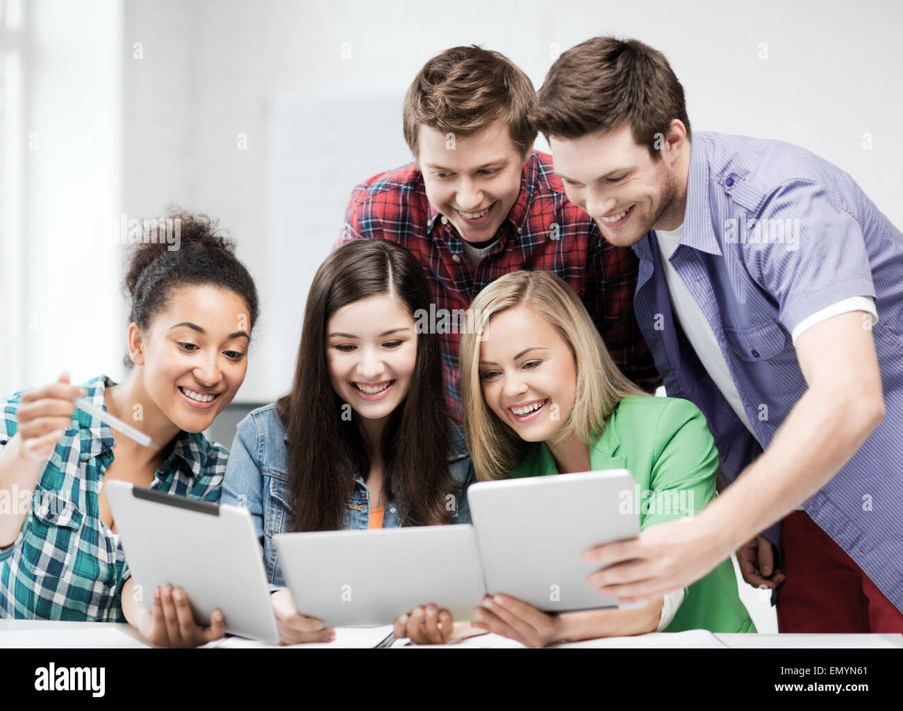 students looking at tablet pc in lecture at school Stock Photo - Alamy