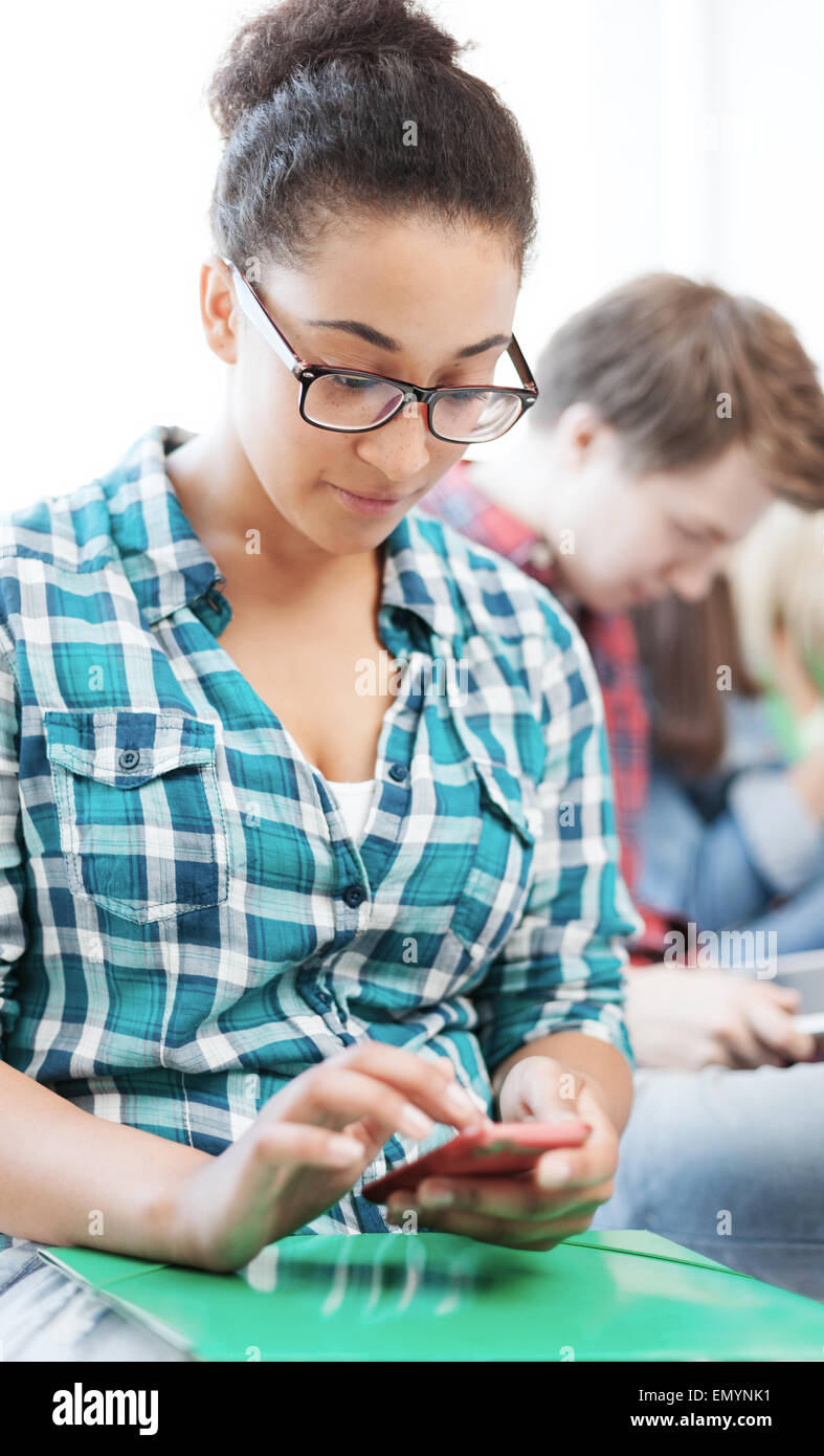 student girl with smartphone at school Stock Photo - Alamy