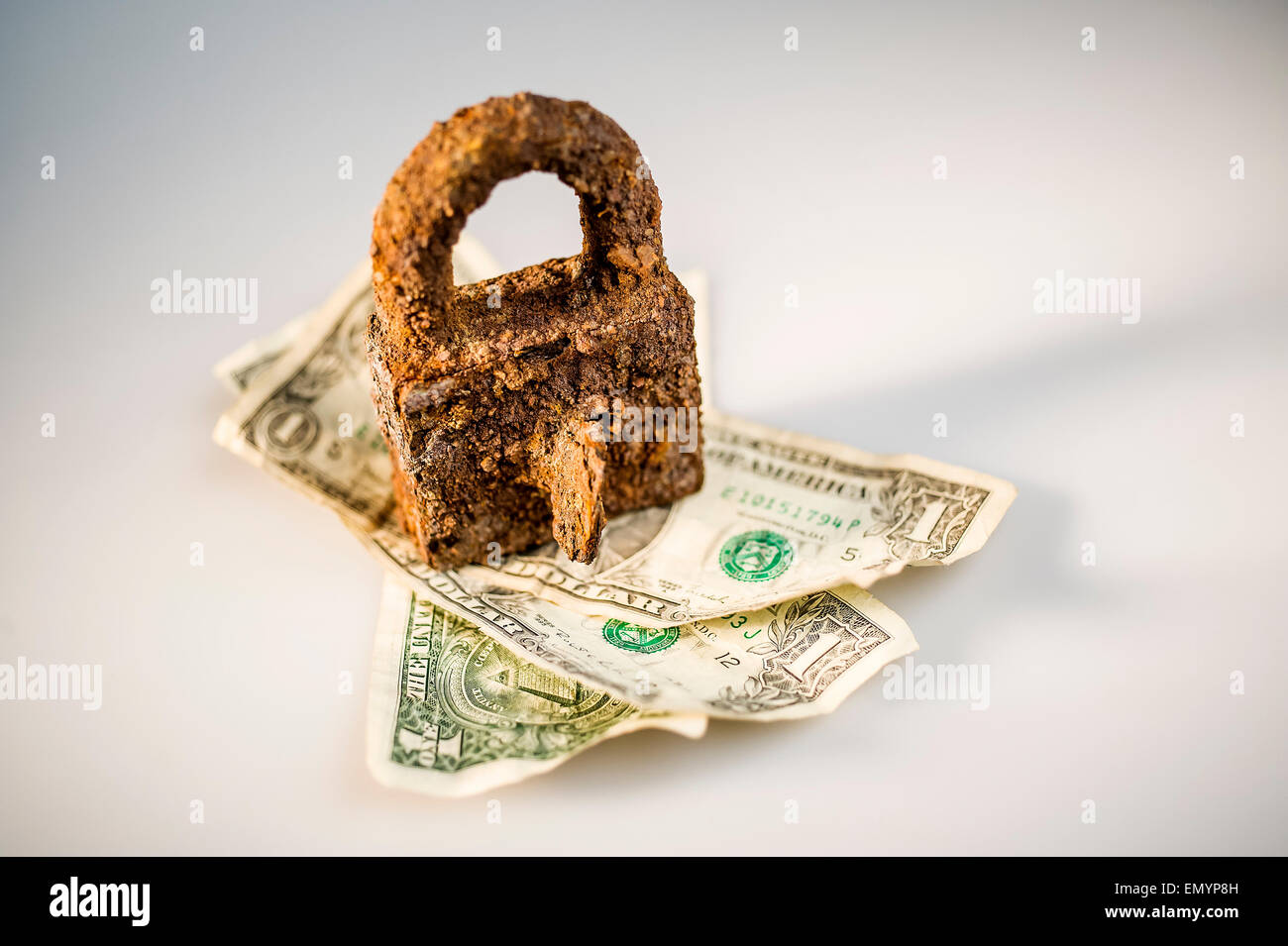 rusty padlock with US dollar Stock Photo - Alamy