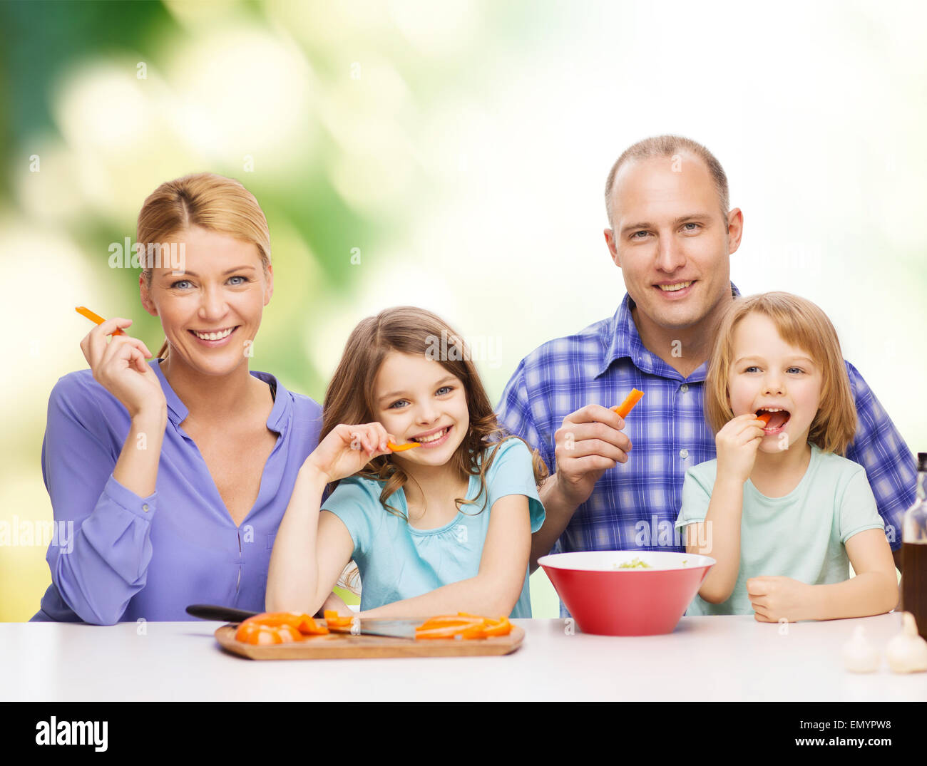 happy family with two kids eating at home Stock Photo - Alamy