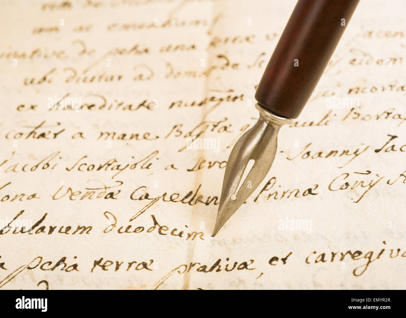 old ink dip pen isolated on white background Stock Photo - Alamy