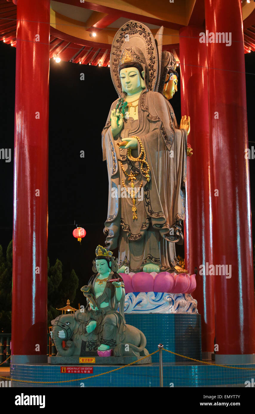 Gorgeous buddha statue light brightly in a buddhish Temple during Wesak ...