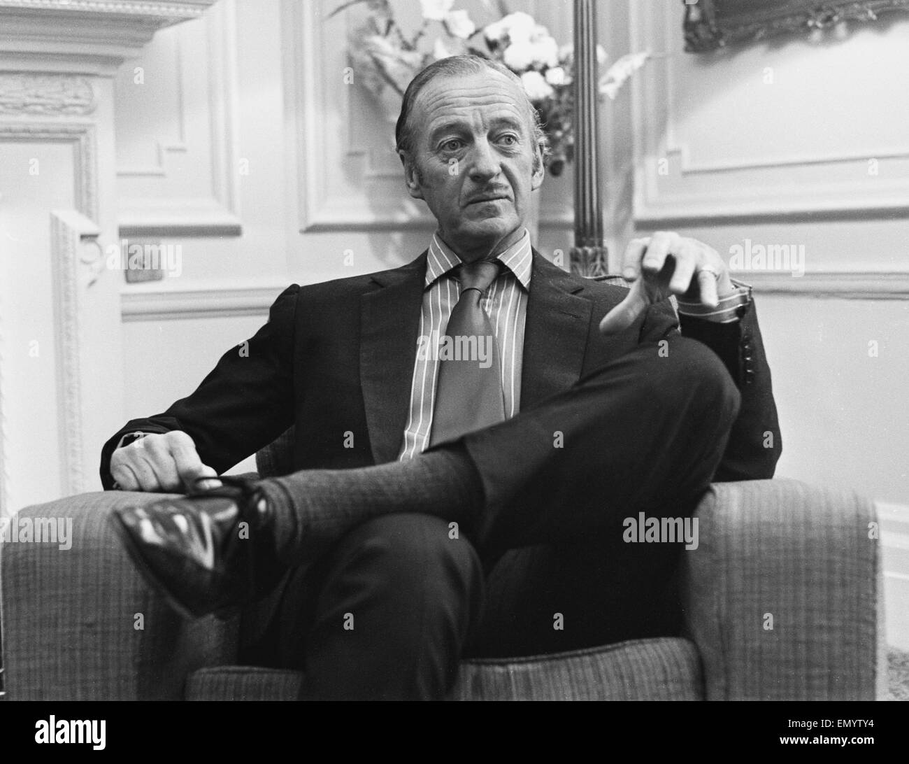 Actor David Niven relaxes in his hotel suite in London. 30th March 1969 ...