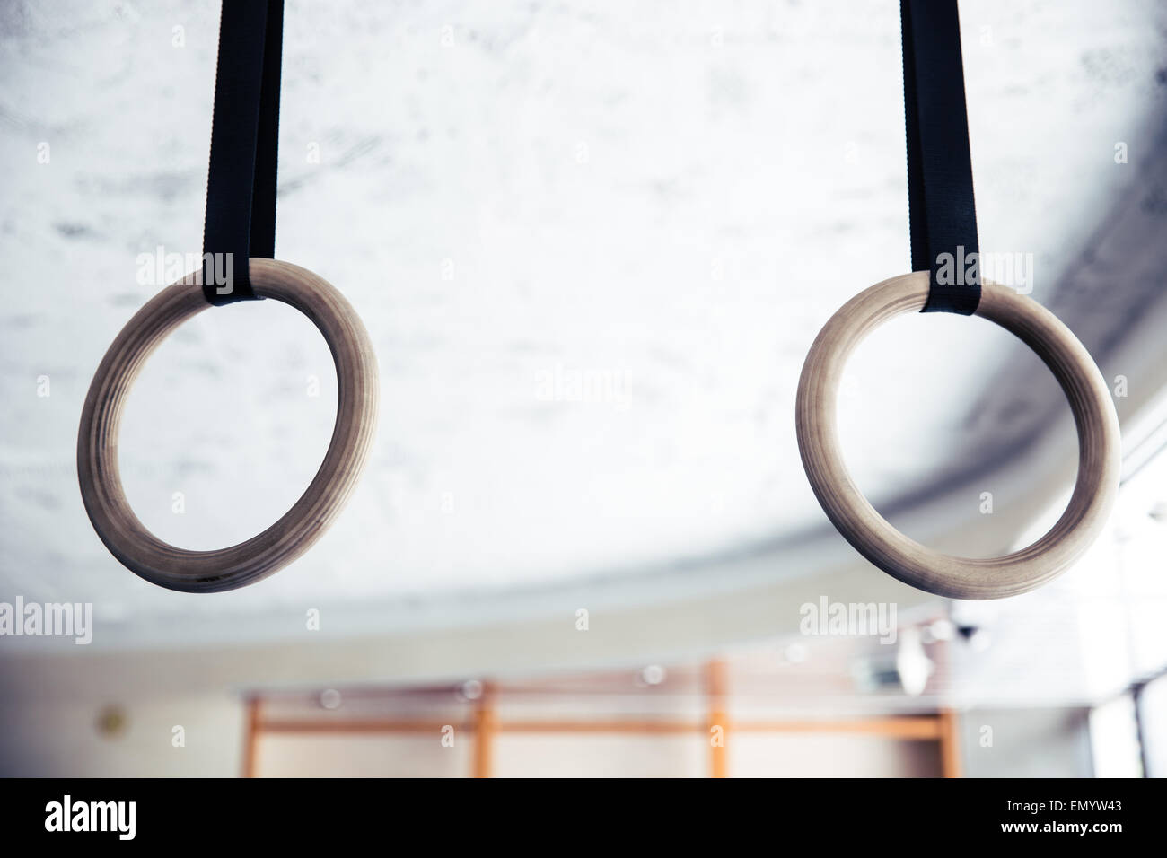 Closeup image of a fitness rings in gym Stock Photo - Alamy