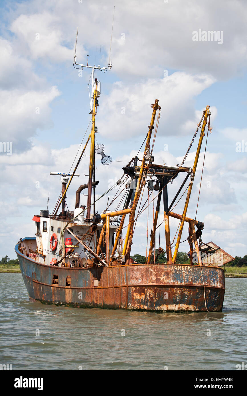 Moored dredger fishing boat, River Crouch, Essex Stock Photo - Alamy