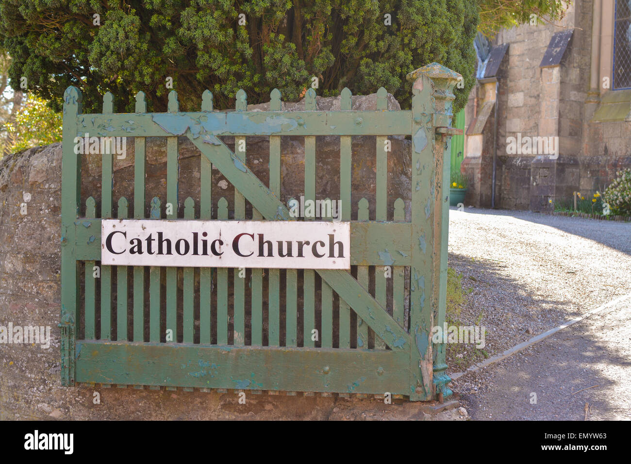 Catholic Church sign on gate ouside the church of St Fillian's and ...