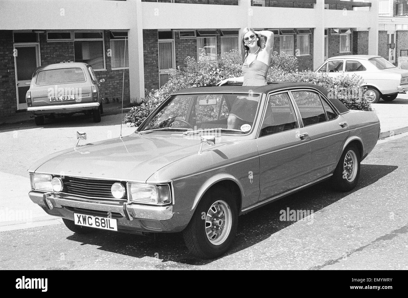 Reveille model Caroline Cheshire seen here posing with a Ford Consul ...