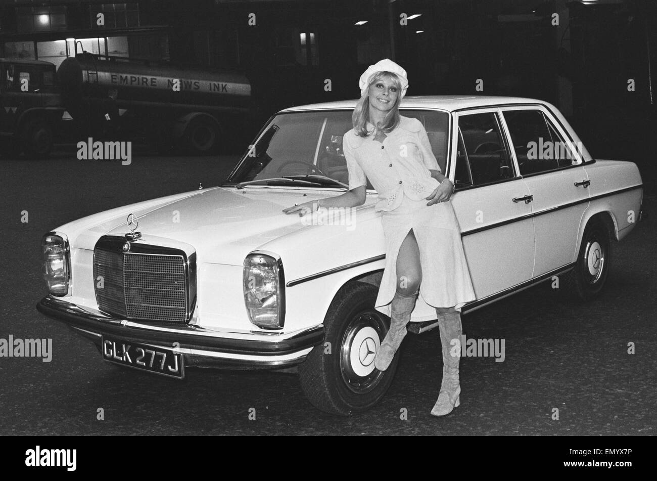 Reveille model seen here posing with a Mercedes Benz car which is top ...