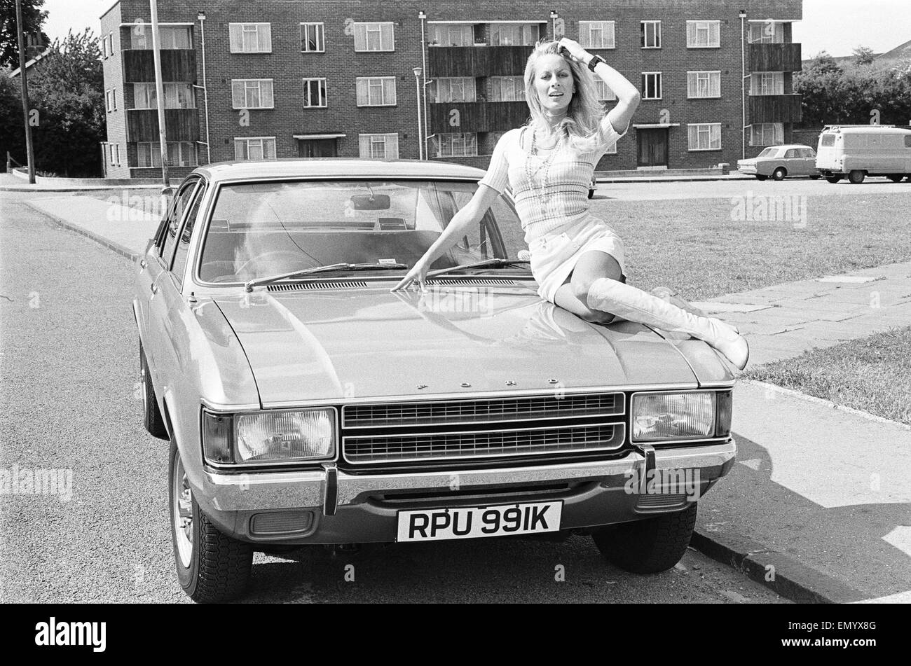 Reveille model Andrea Lloyd seen here posing with a Ford Consul which ...