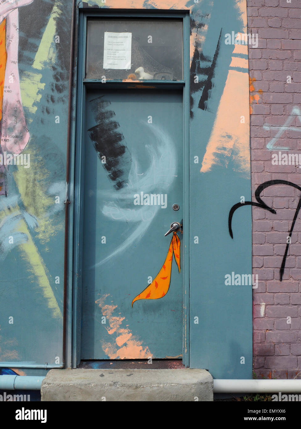 Metal door - graffiti Stock Photo - Alamy
