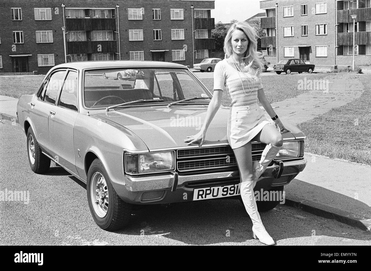 Reveille model Andrea Lloyd seen here posing with a Ford Consul which ...